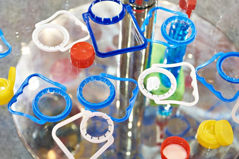Plastic Bottle Caps and Cap Holders Stock Image - Image of ...