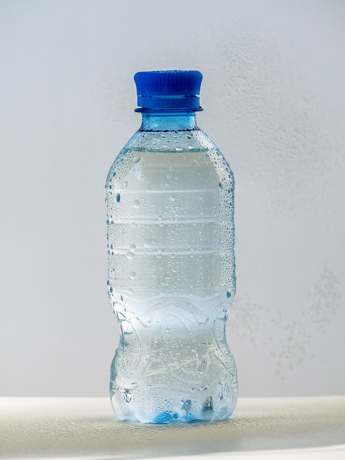 Plastic Bottle with Clean Cold Water on a Light Background. the Bottle ...