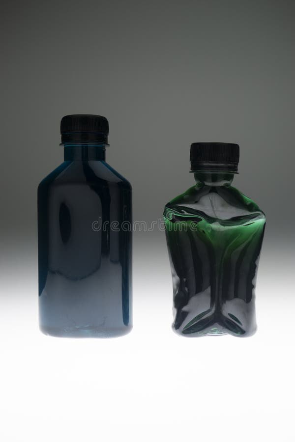 Plastic Bottle Containers with Food Colouring Mixing Creating Unique ...