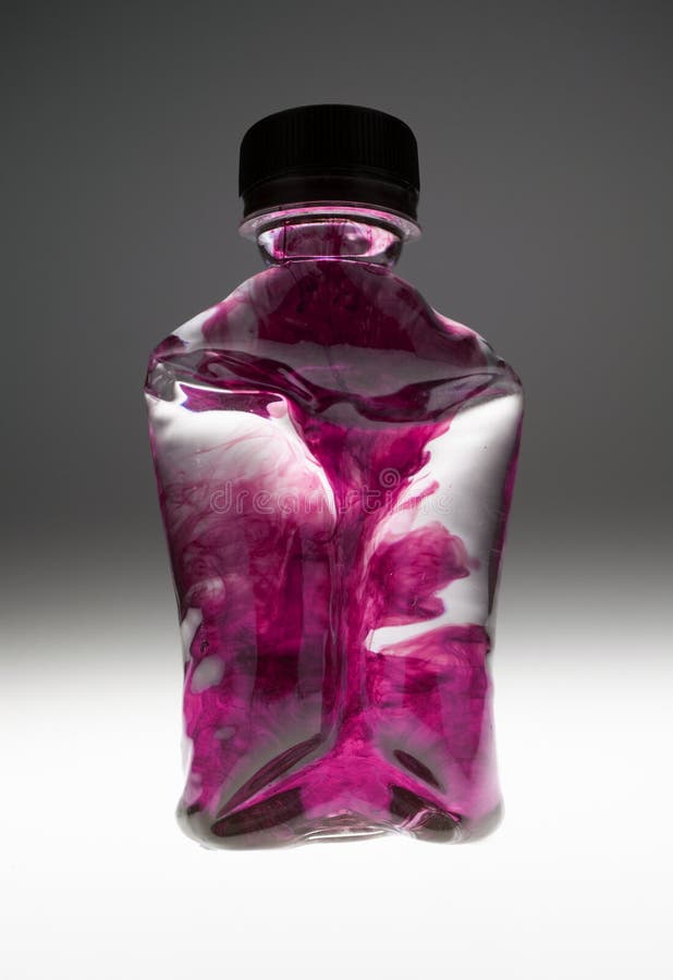 Plastic Bottle Containers with Food Colouring Mixing Creating Unique ...