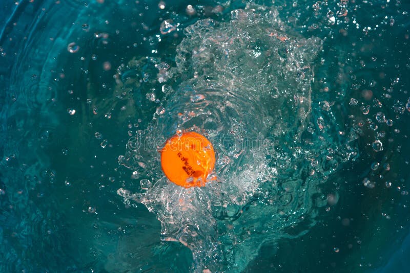 Plastic Bottle Falling into the Water Making Splashes and Spraying ...