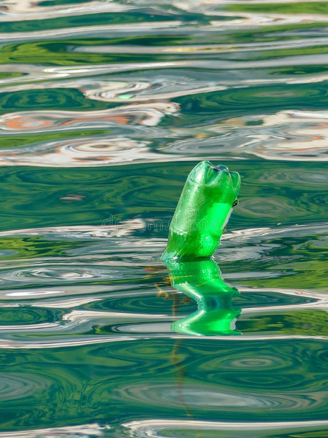 Plastic Bottle Floating in the Water Stock Image - Image of coral ...