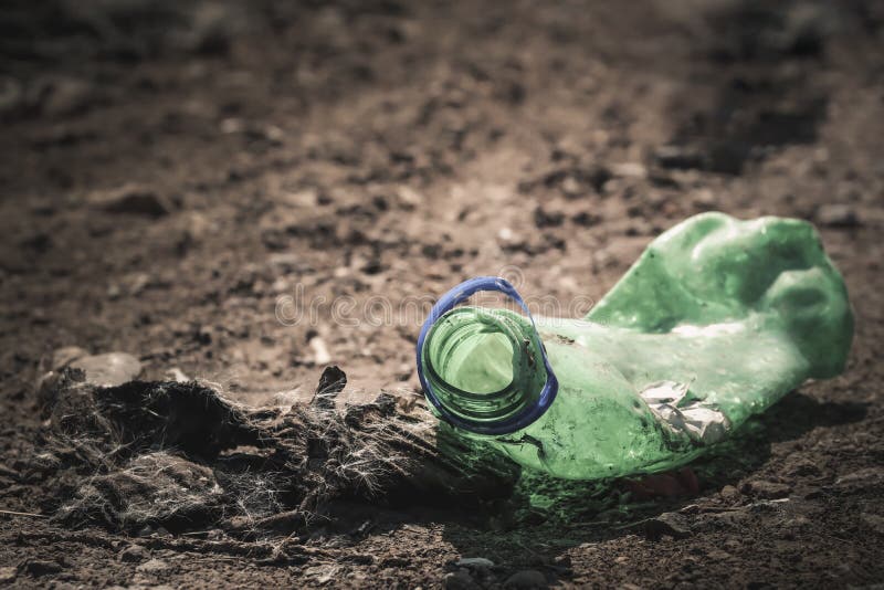 Plastic bottle on ground. stock photo. Image of ecology - 50357516