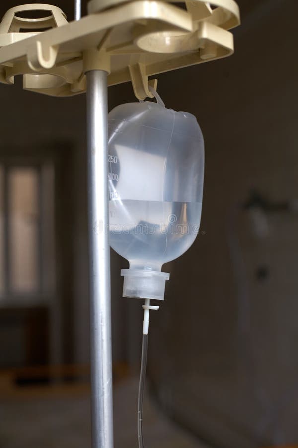 A Plastic Bottle with an Infusion Solution is Connected To the Infusion ...
