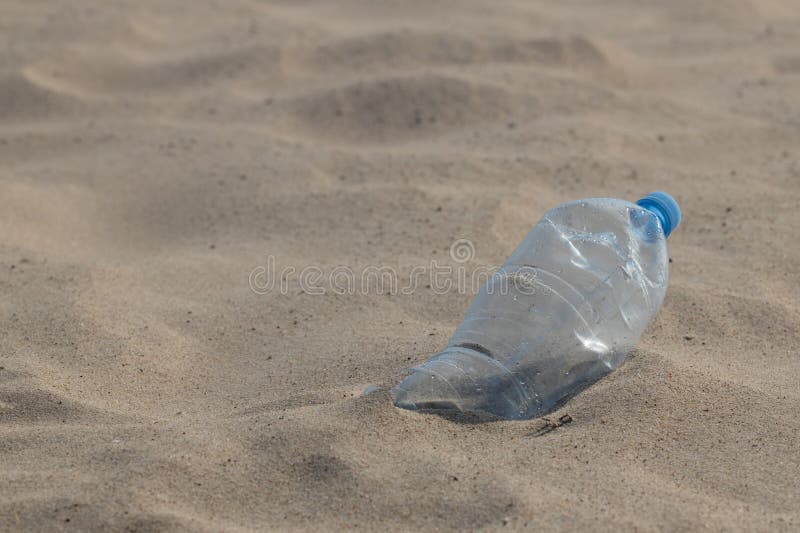 Plastic Bottle Litter on Beach Sand Waste Issues Stock Photo - Image of ...