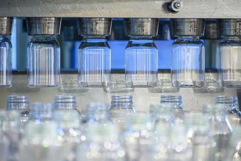 The Plastic Bottle Manufacturing Process by Vertical Blow Mold Machine ...