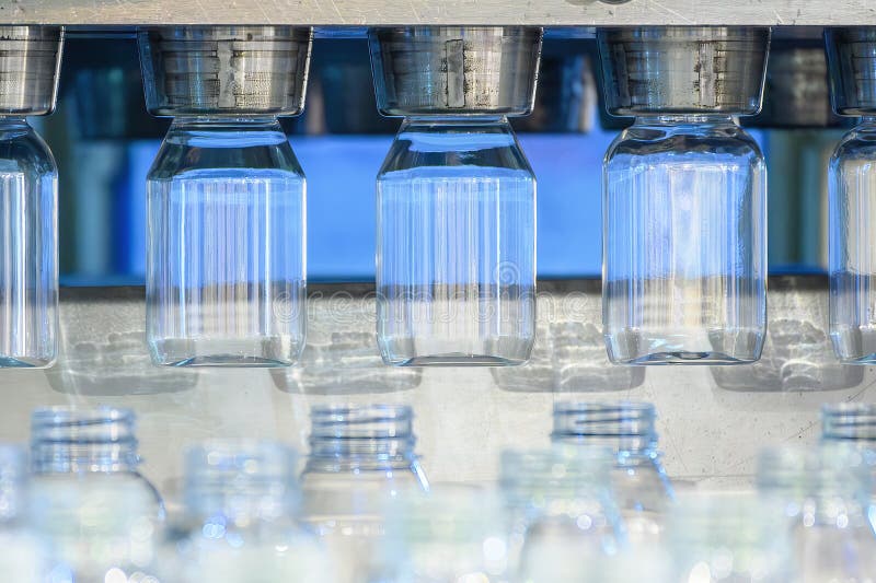 The Plastic Bottle Manufacturing Process by Vertical Blow Mold Machine ...