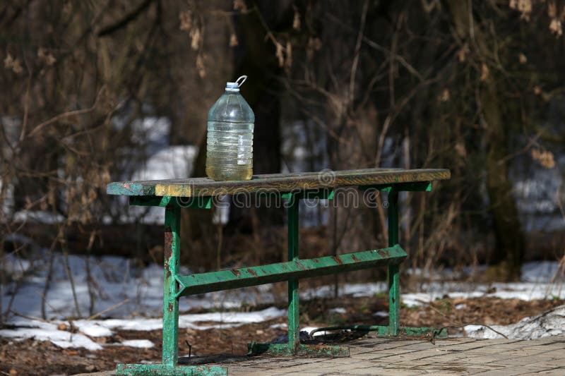 Plastic Bottle of Some Liquid on the Table Stock Image - Image of leaf ...