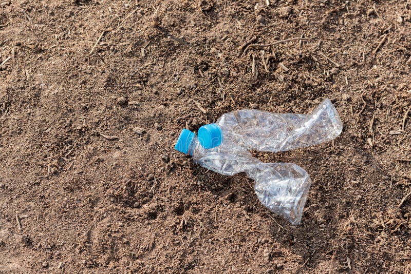 Plastic Bottle Waste is Thrown on the Ground. Stock Image - Image of ...