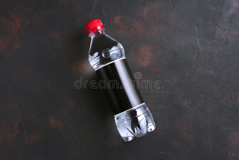 Plastic Bottle of Water with Black Label and Red Cap Stock Photo ...