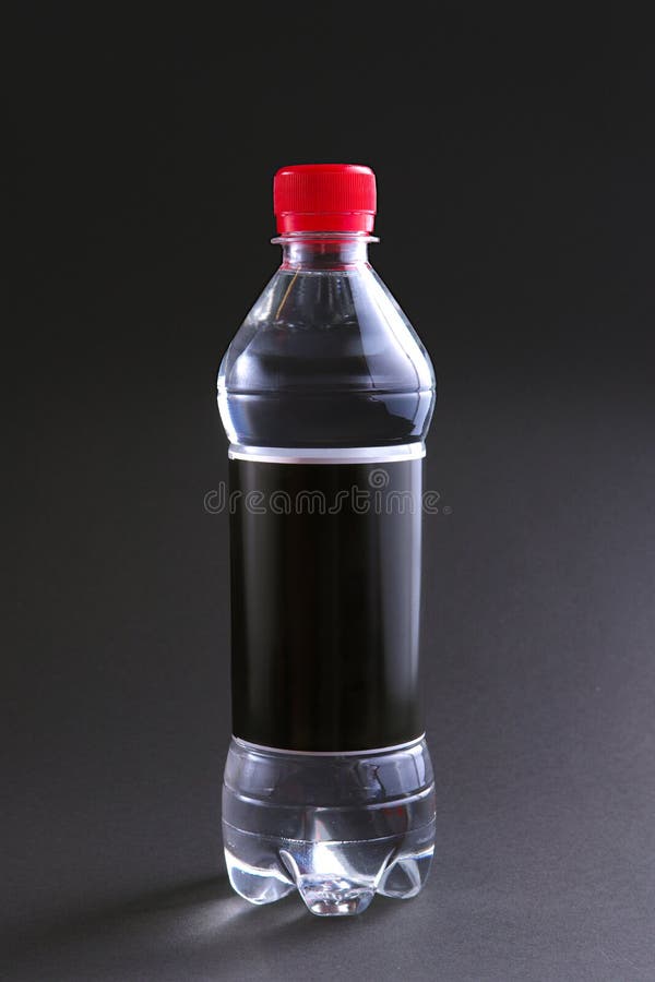 Plastic Bottle of Water with Black Label and Red Cap Stock Photo ...