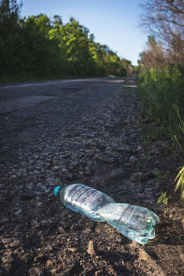 Plastic Bottle with Water by the Road Stock Image - Image of ...