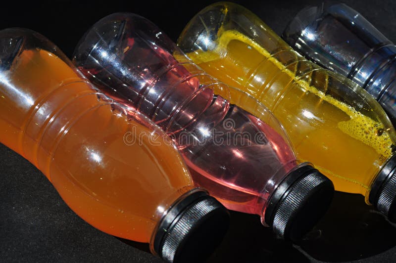 Plastic Bottles with Colored Liquid Stock Photo - Image of healthy ...