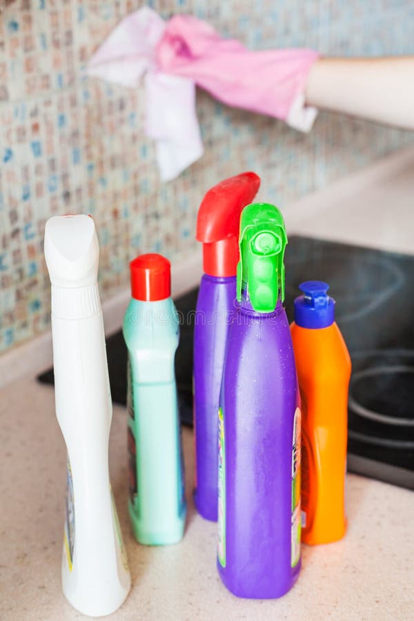 Plastic Bottles with Detergents on Kitchen Worktop Stock Photo - Image ...