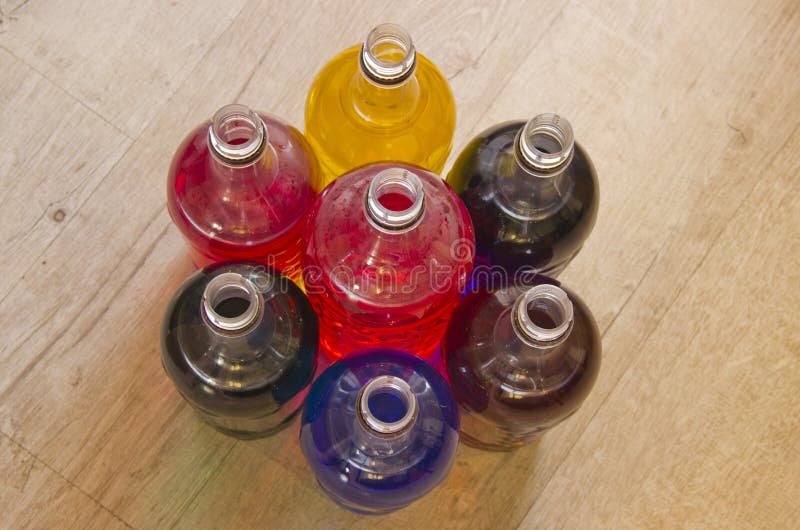 Bottles Filled with Liquid of Different Colors Stock Photo - Image of ...