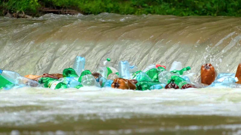 The Garbage in the River with Rock Background Stock Video - Video of ...