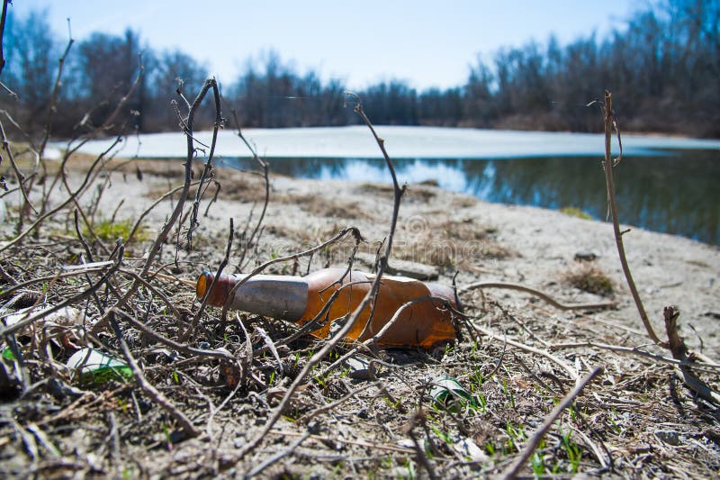 Garbage Waste on the Shore of a River Stock Photo - Image of ...