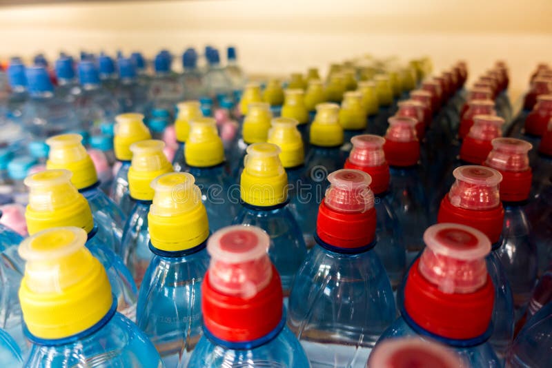 Plastic Bottles with Water, Color Caps Stock Photo - Image of object ...