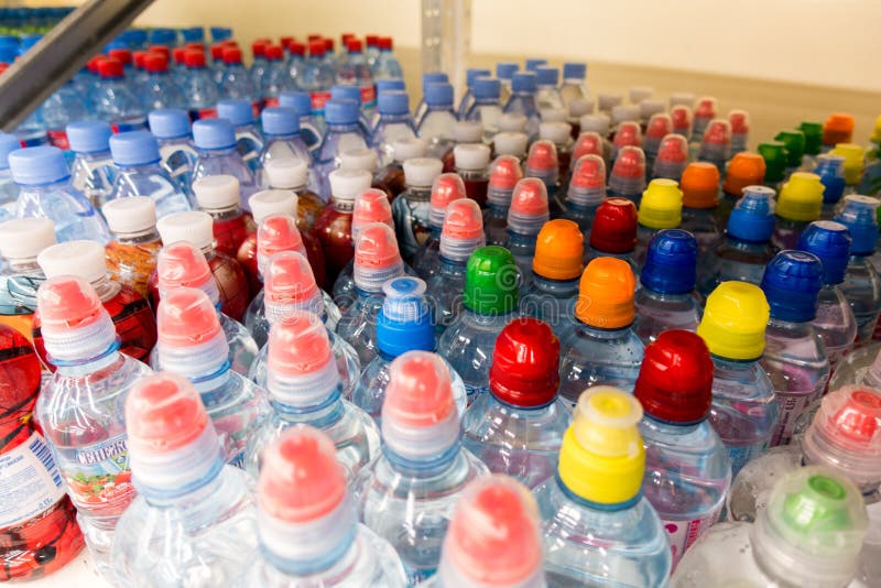 Plastic Bottles with Water, Color Caps Stock Image - Image of natural ...