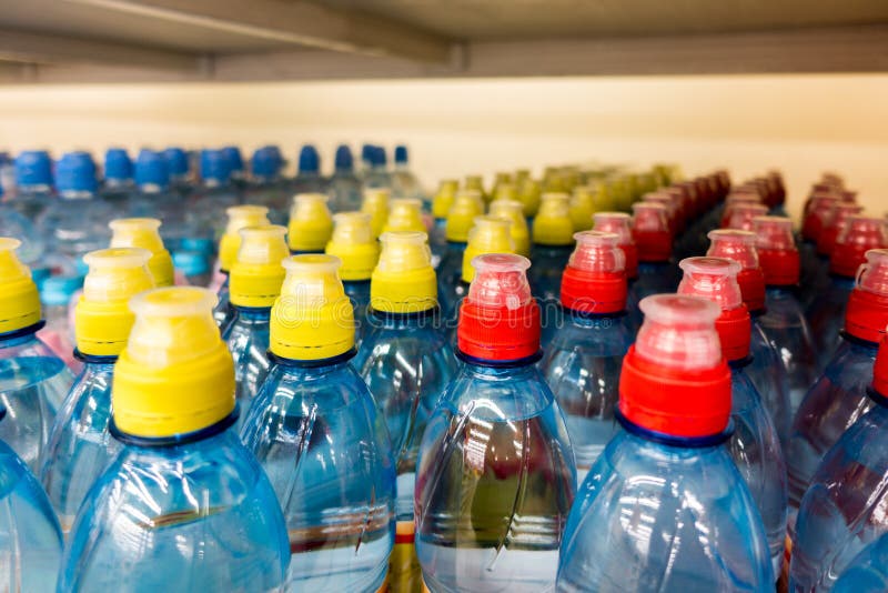 Plastic Bottles with Water, Color Caps Stock Image - Image of clean ...