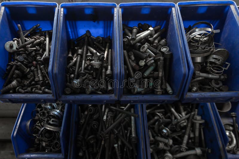 Plastic Box with a Bunch of Nuts, Bolts and Screws. Tools and Fasteners ...