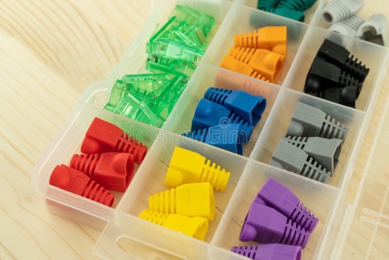 Plastic Box Full of Caps for Rj 45 Cable Red, Green and Yellow Stock ...