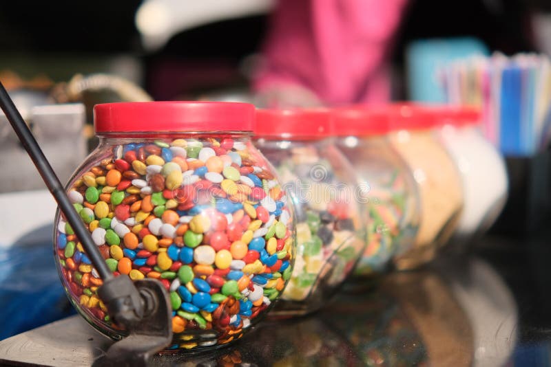 Plastic Boxes with Colorful Chocolate Button Candies Stock Photo ...