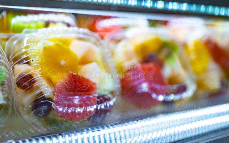 Plastic Boxes with Fresh Fruits in a Commercial Refrigerator Stock ...
