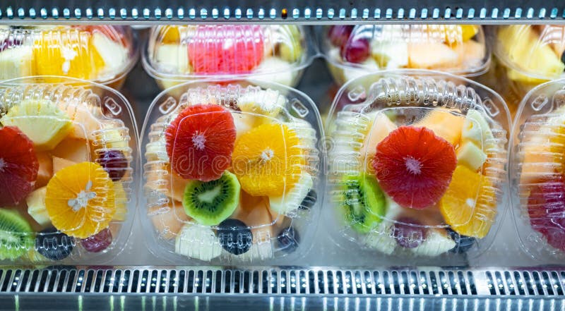Plastic Boxes with Fresh Fruits in a Commercial Refrigerator Stock ...
