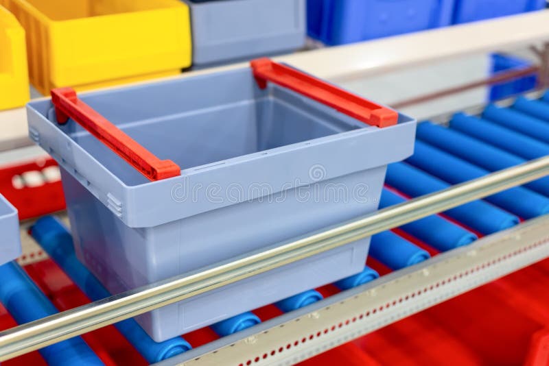 Plastic Boxes on the Roller Conveyor. Stock Photo - Image of equipment ...