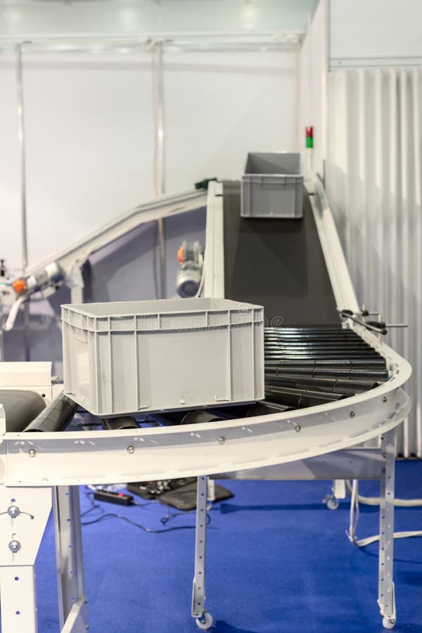 Plastic Boxes on the Roller Conveyor. Stock Photo - Image of ...