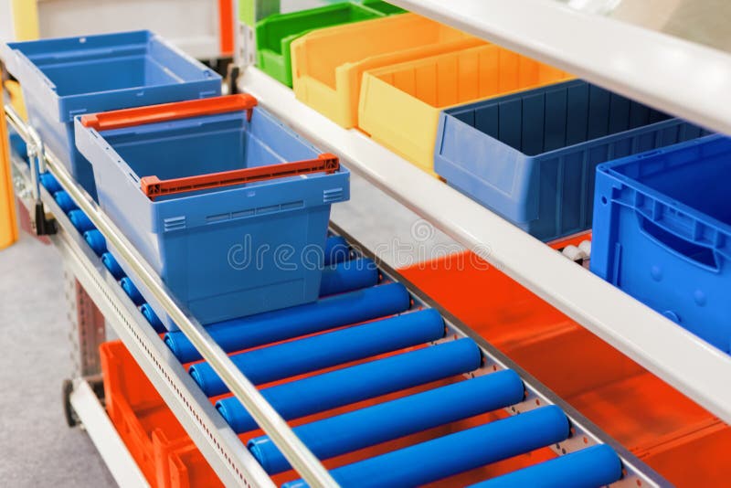 Plastic Boxes on the Roller Conveyor. Stock Photo - Image of industry ...
