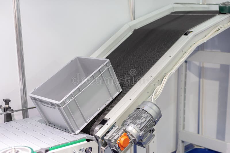 Plastic Boxes on the Roller Conveyor. Stock Photo - Image of shelf ...