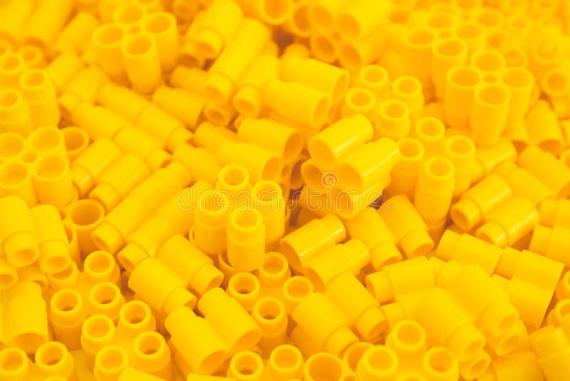 Plastic Bricks of Yellow Color and Details of the Toy. Yellow ...