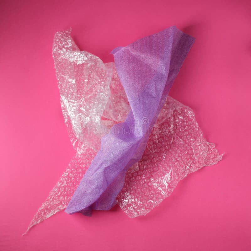 Plastic Bubble and Foam Cushioning Wrap on Pink Stock Photo - Image of ...