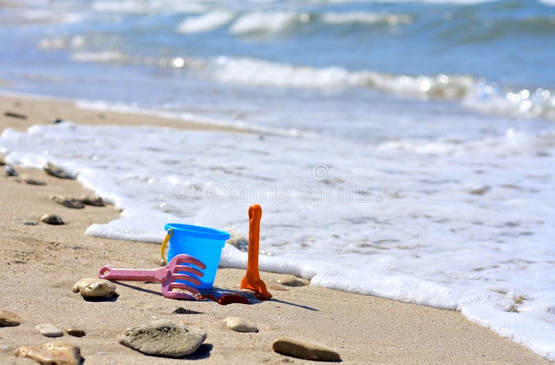 Plastic Bucket on the Beach Stock Photo - Image of activity, playing ...