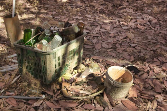 Plastic Bucket of Empty Bottles Left on the Ground. Stock Photo - Image ...