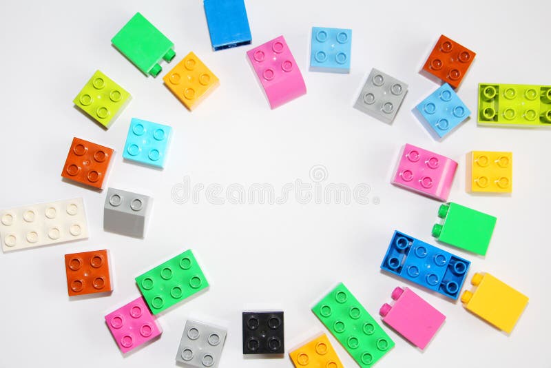 Plastic Building Blocks on a White Background. Multi-colored Cubes ...