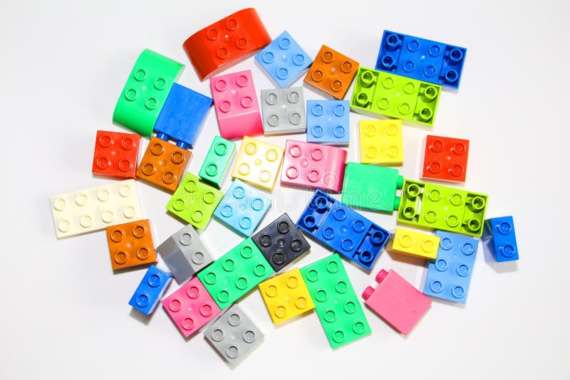 Plastic Building Blocks on a White Background. Multi-colored Cubes ...