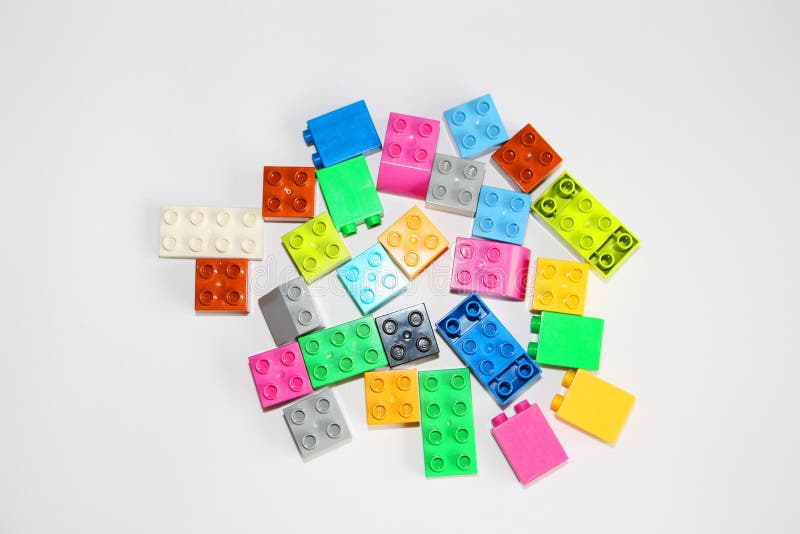 Plastic Building Blocks on a White Background. Multi-colored Cubes ...