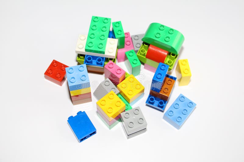 Plastic Building Blocks on a White Background. Multi-colored Cubes ...