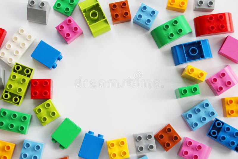 Plastic Building Blocks on a White Background. Multi-colored Cubes ...