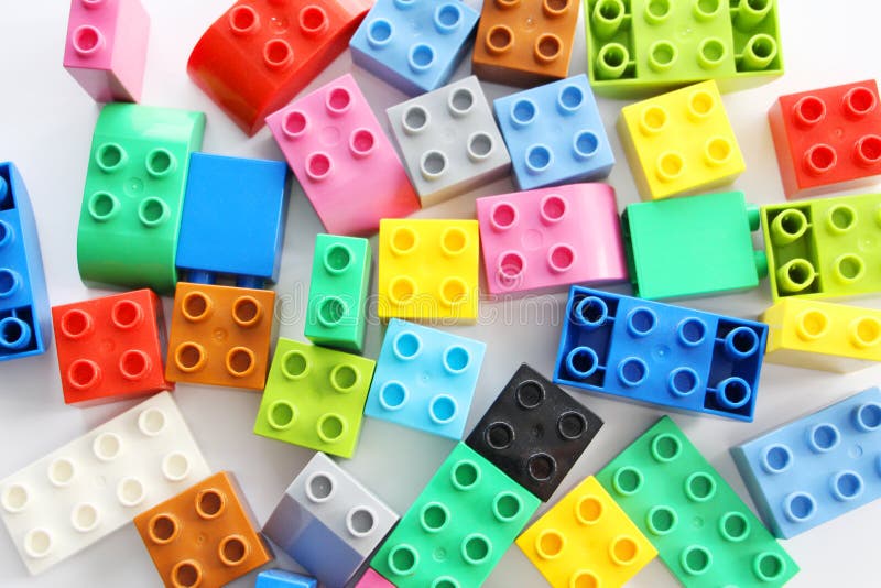 Plastic Building Blocks on a White Background. Multi-colored Cubes ...