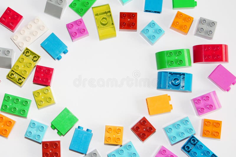 Plastic Building Blocks on a White Background. Multi-colored Cubes ...