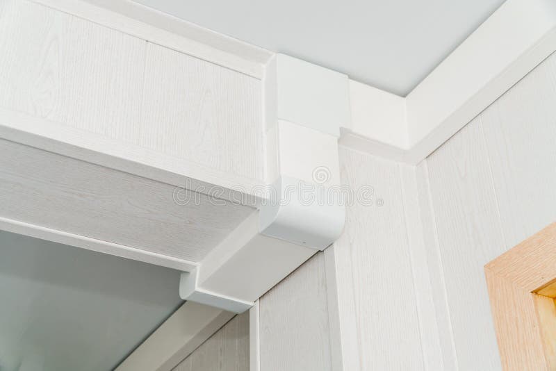 Plastic a Cable of the Channel on a White Wal Stock Photo - Image of ...