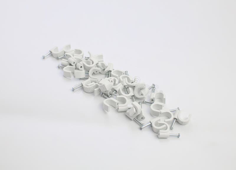 Plastic Cable Clips with Nails for Wire Management on White Background ...