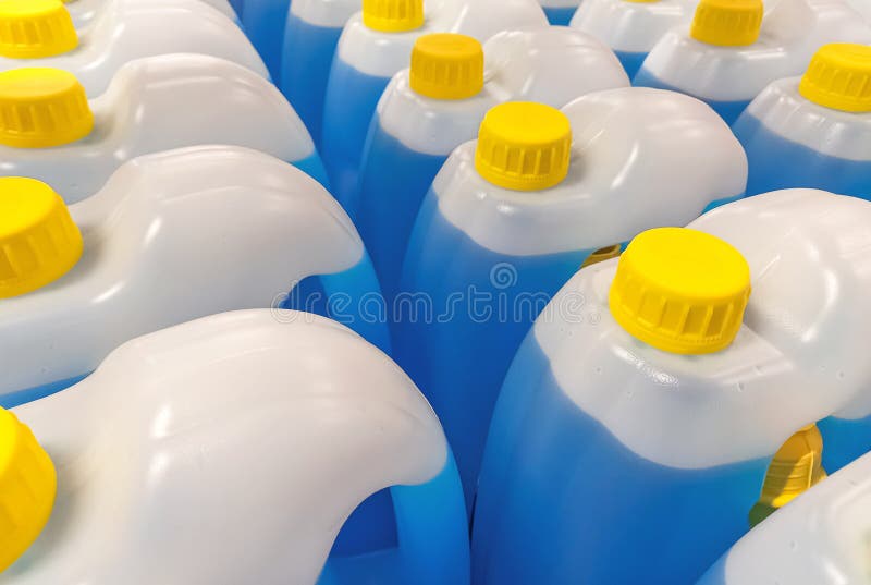 Plastic Canisters with Blue Liquid for Windshield Washer Fluid Stock ...