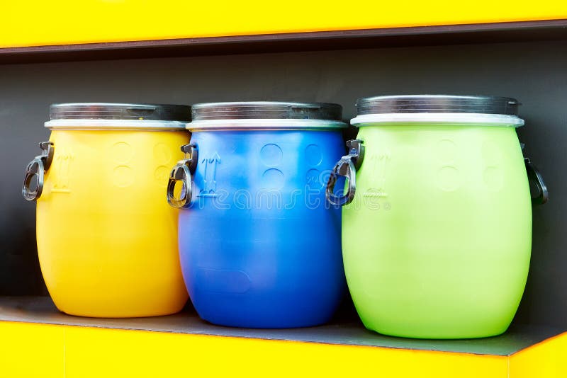 Plastic Canisters for Liquid in Store Stock Photo - Image of business ...