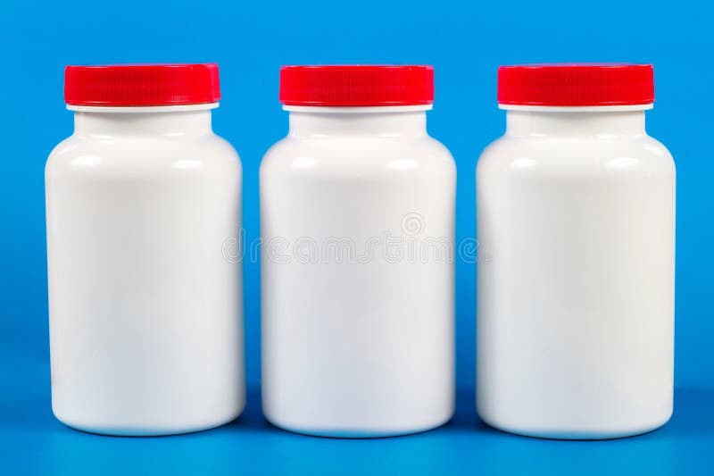 Plastic Cans of White Color with Red Lids on a Blue Background. Stock ...