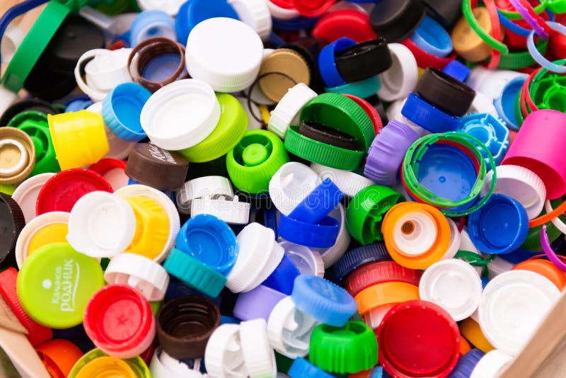 Plastic caps in a bag editorial image. Image of collection - 179746415